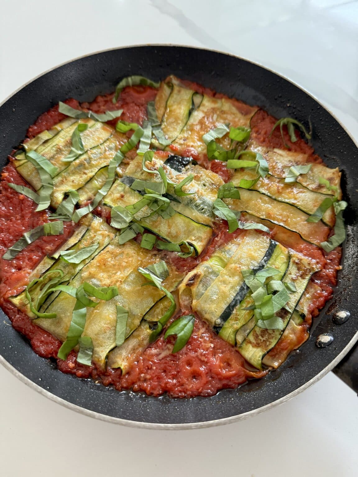 stuffed zucchini parcels in tomato sauce - The Culinary Chase